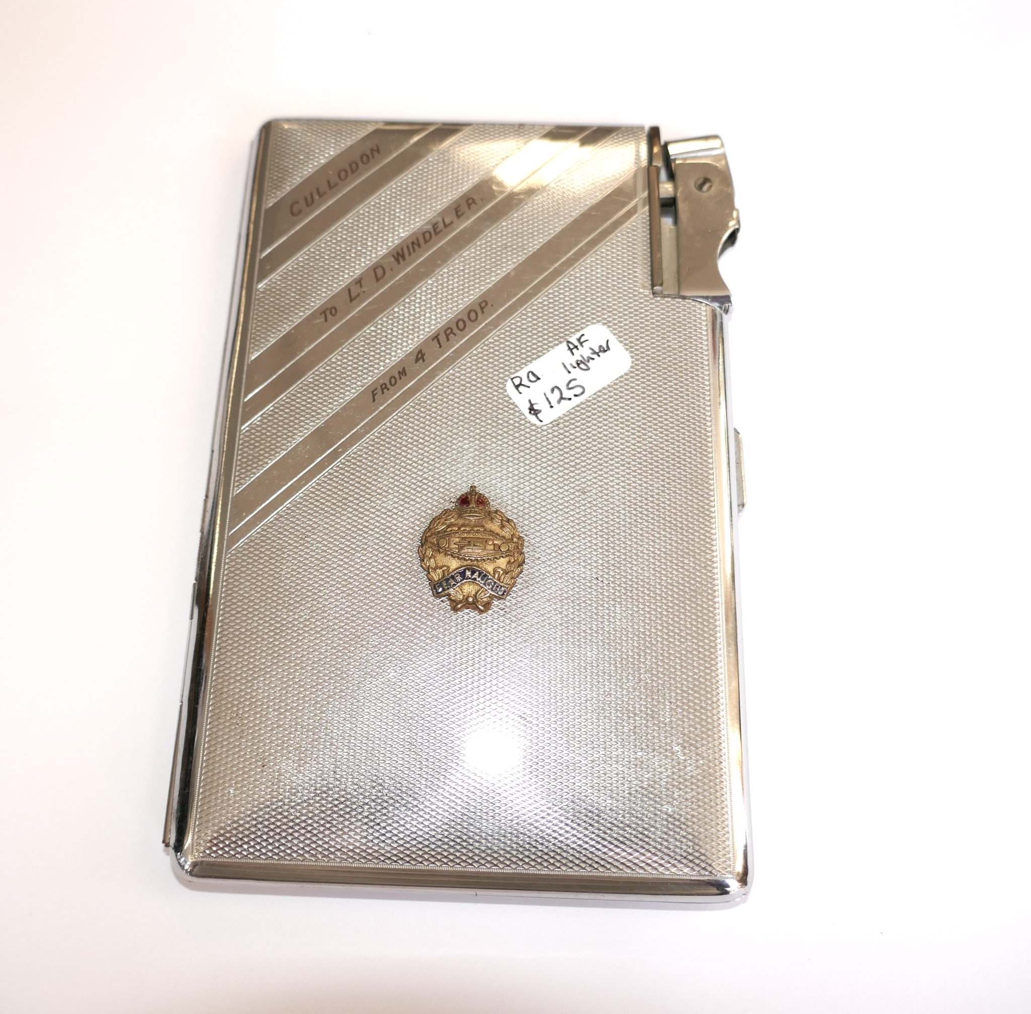 Military Cigarette lighter and case. From 4 Troop – Napier Antiques